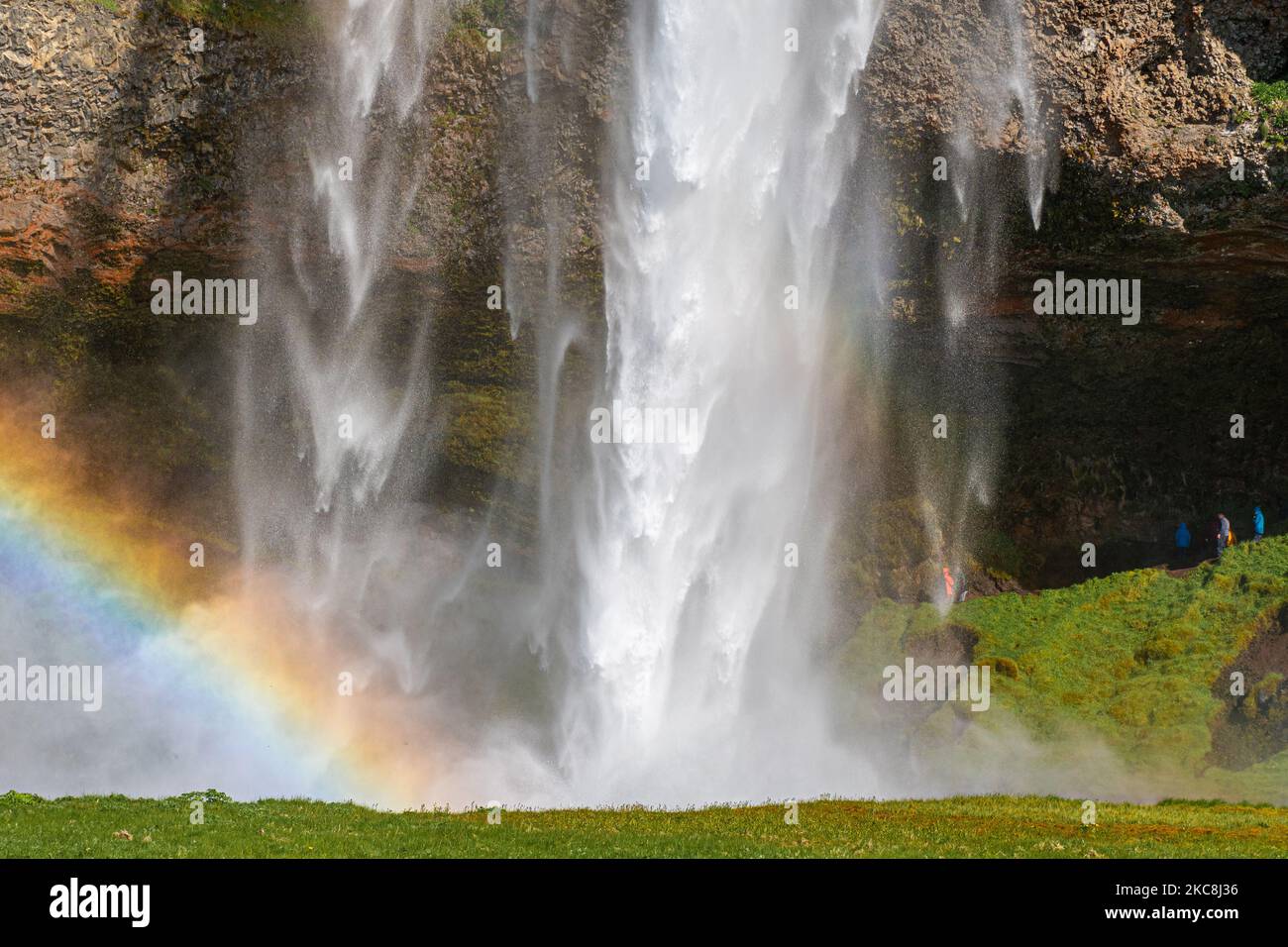 The waterfall Seljalandsfoss with a rainbow, famous landmark in ...