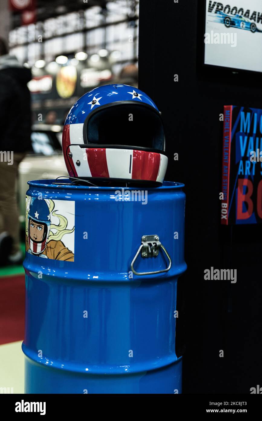 A vertical shot of a racing helmet with an American flag livery on top ...