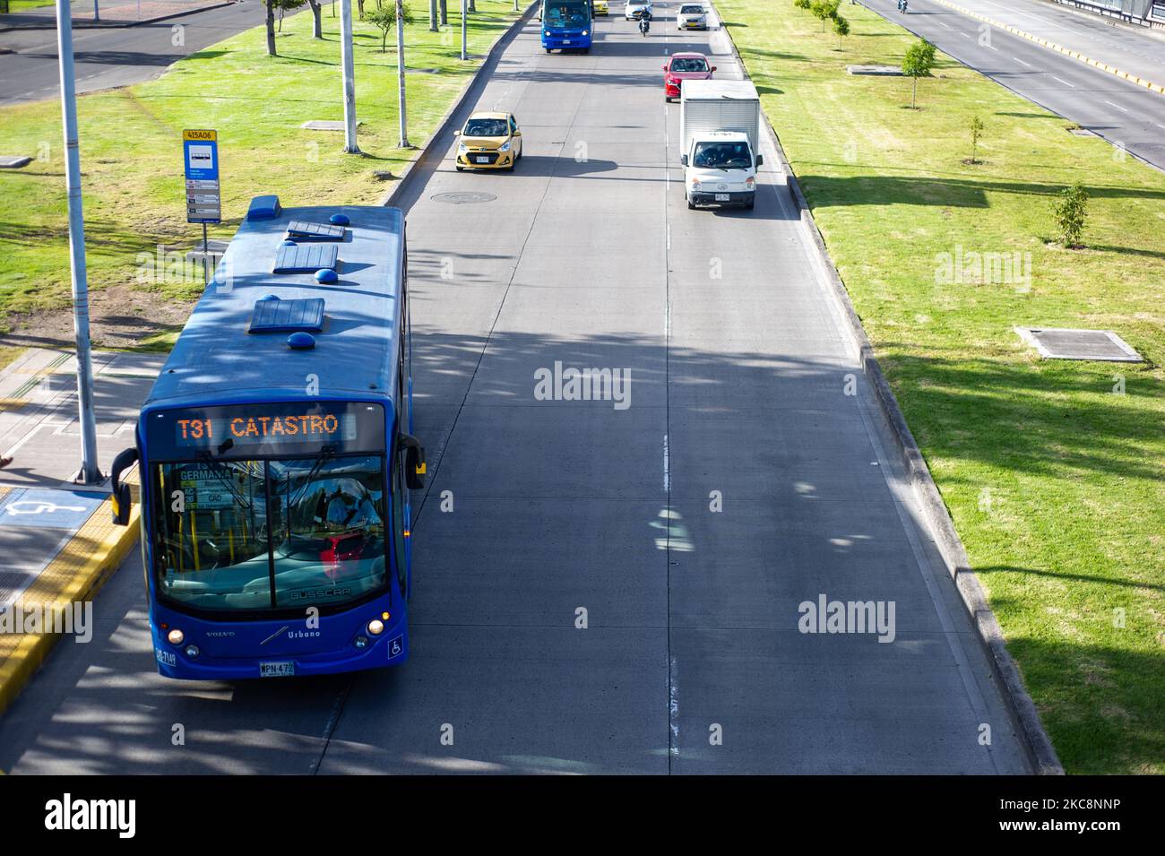 Transmilenio SITP buses departure from a zonal bus stop. On February 3 ...