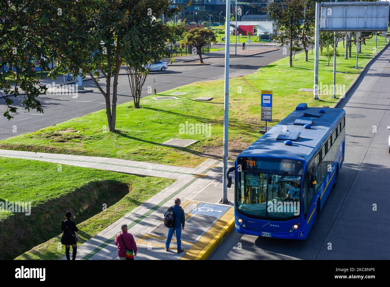 Transmilenio SITP buses departure from a zonal bus stop. On February 3 ...