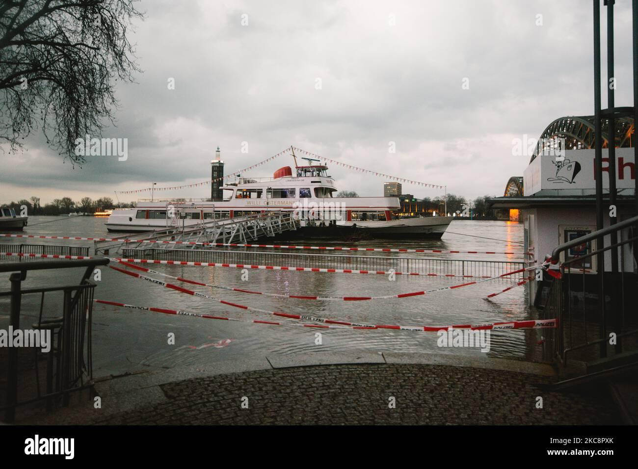 a passenger ship is seen on the bank of the flooded rhine river in ...