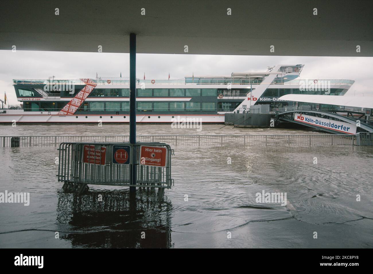 a passenger ship is seen on the bank of the flooded rhine river in ...