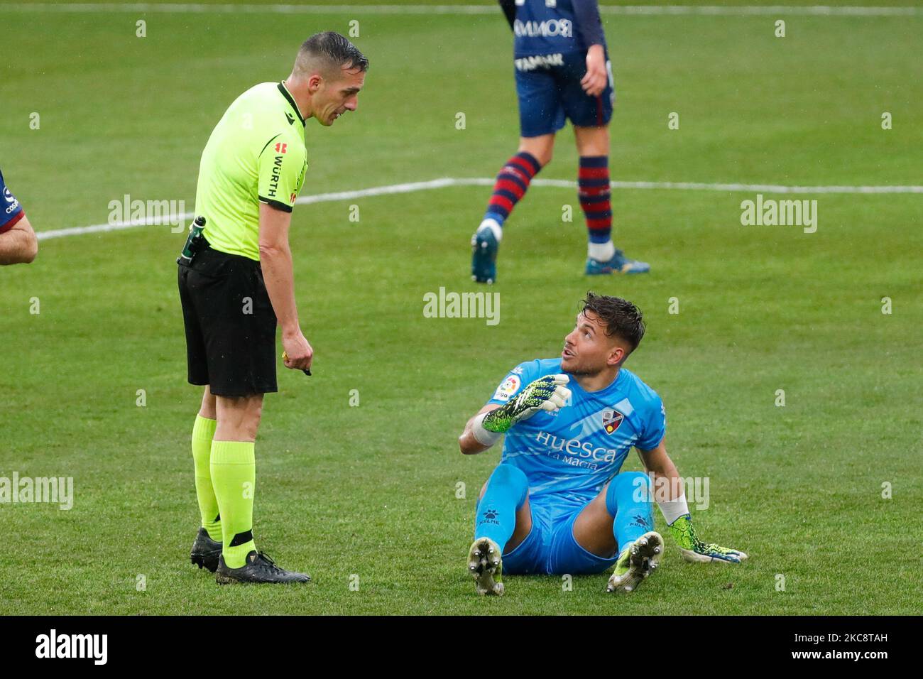 Alvaro Fernandez of SD Huesca with a Referee during La Liga match ...