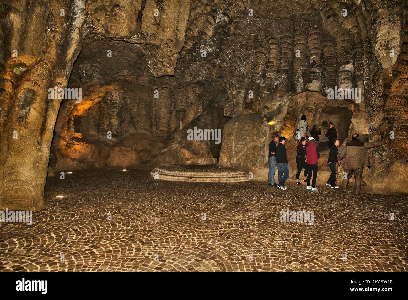 Tourists walk through the Caves of Hercules (Grottes d'Hercule) in ...