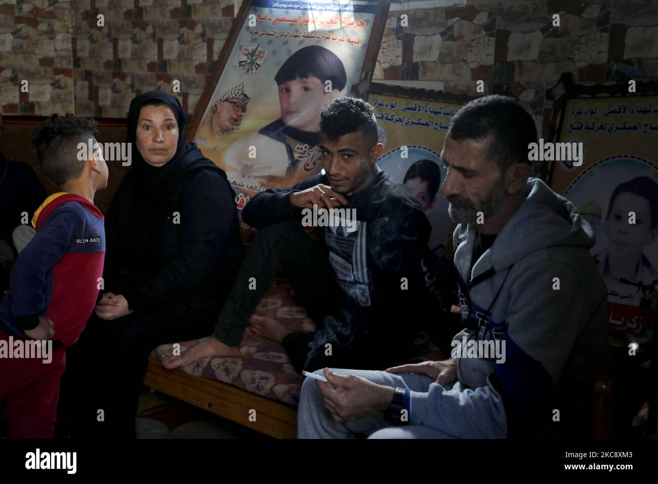 Members of the Bakr family gather in their house in al-Shati refugee ...