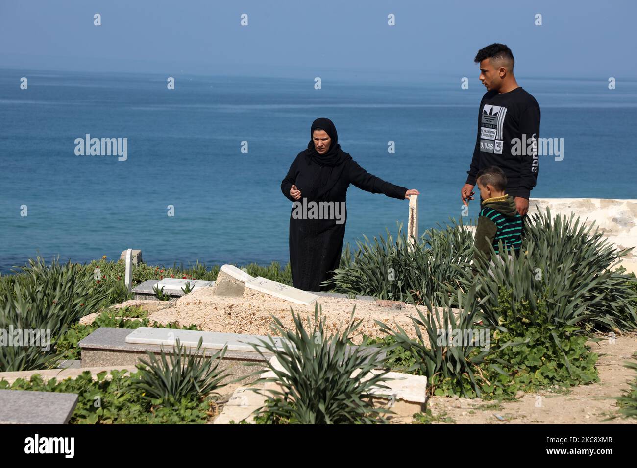 The mother and brother of Mohammad, one of the four children from the ...