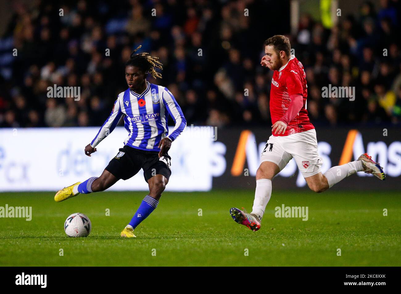 Alex Mighten #45 of Sheffield Wednesday and Ryan Cooney #21 of ...