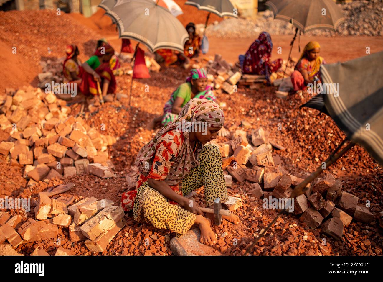 Women break bricks as they earn less-than five dollar for a day in ...