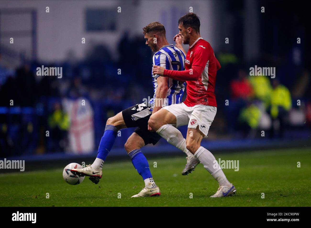 Michael Smith #24 of Sheffield Wednesday and Ryan Delaney #6 of ...