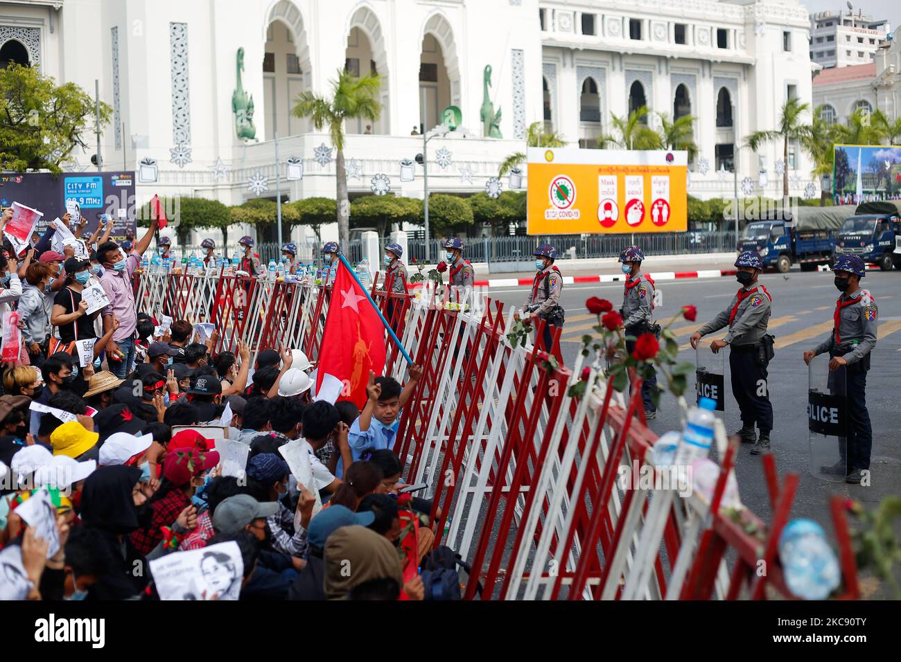Myanmar riot police stand guard on a street during a demonstration ...