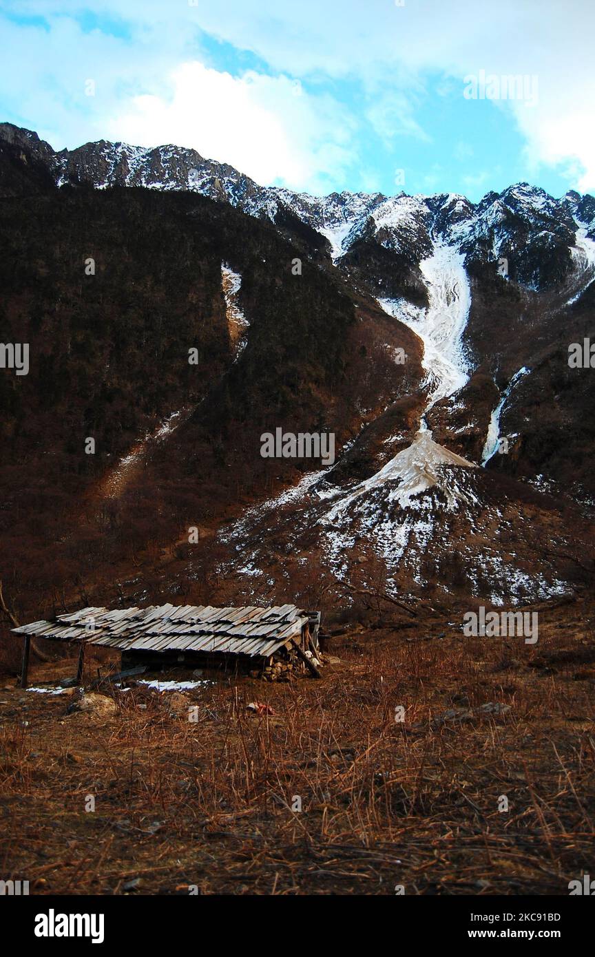 A beautiful view of a snowy mountain with a blue sky background Stock ...
