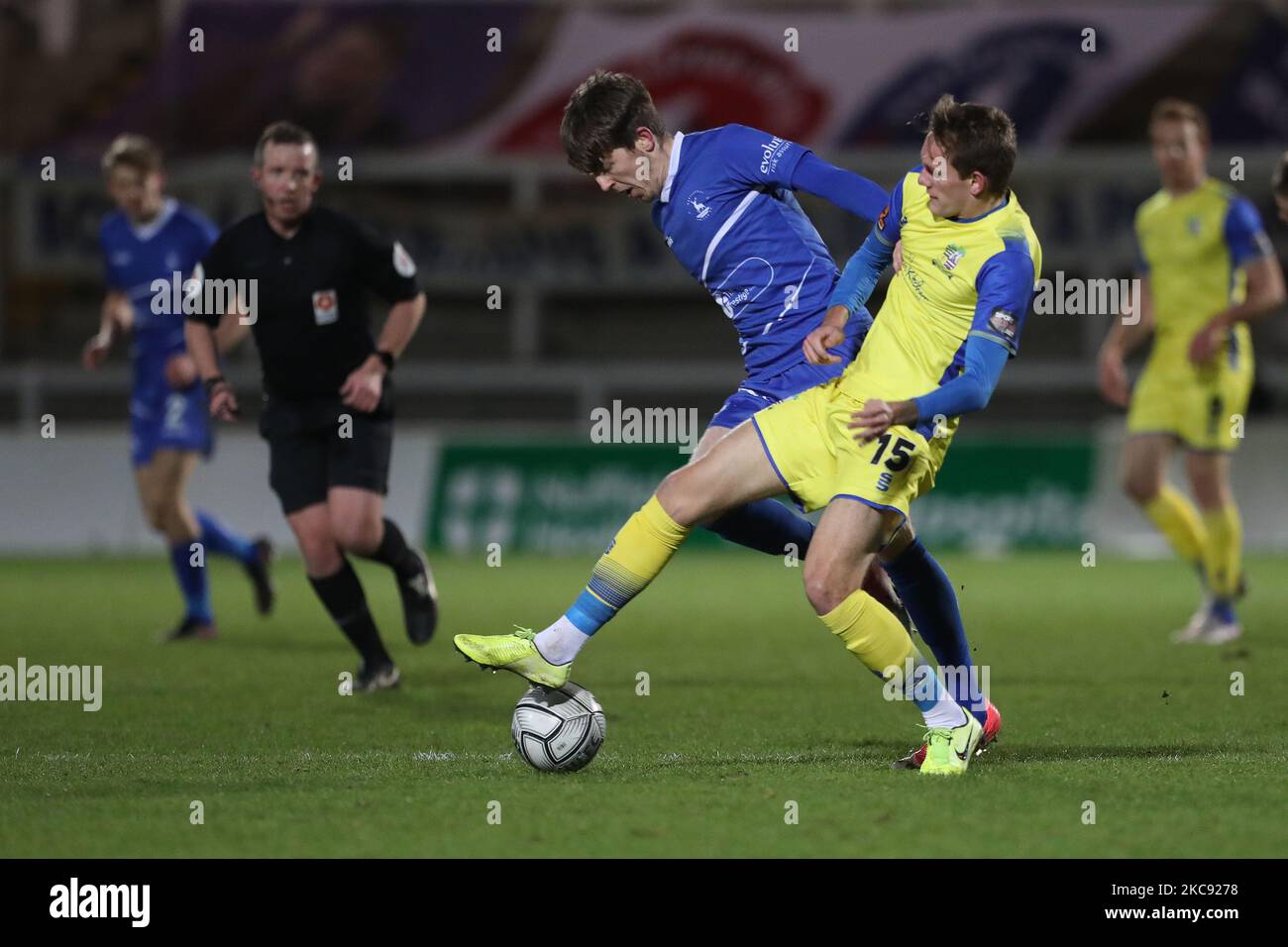 Tom Crawford of Hartlepool United in action with Callum Maycock of ...