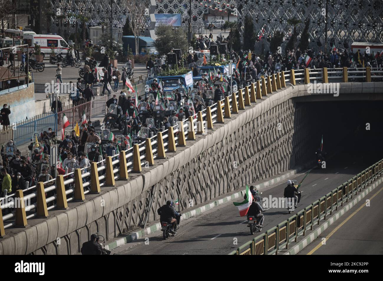 Iranian motorcyclists take part a rally to commemorate the 42nd Victory ...