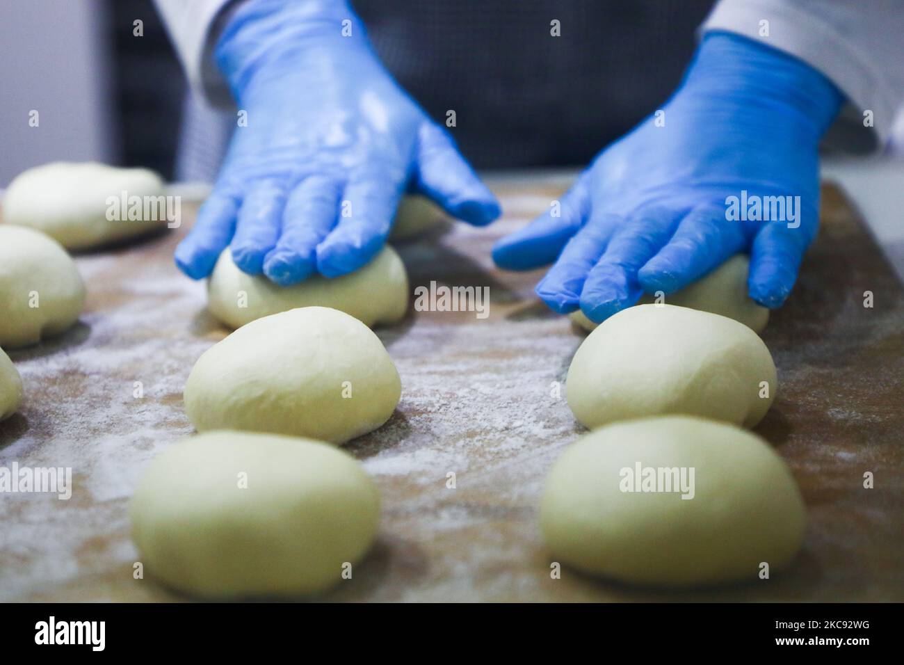 Bakery 'Dobra Paczkarnia' produces donuts for Fat Thursday. Krakow ...