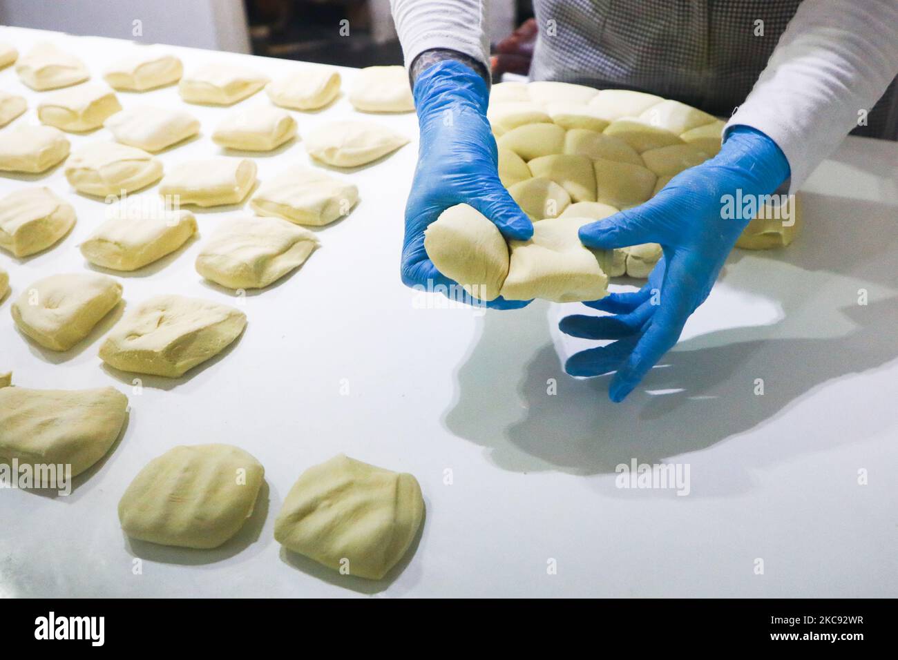 Bakery 'Dobra Paczkarnia' produces donuts for Fat Thursday. Krakow ...
