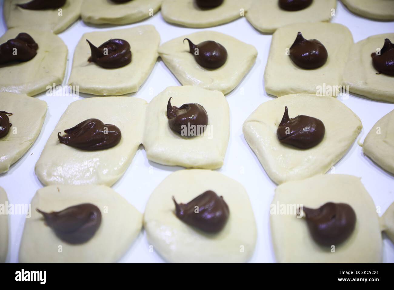 Bakery 'Dobra Paczkarnia' produces donuts for Fat Thursday. Krakow ...