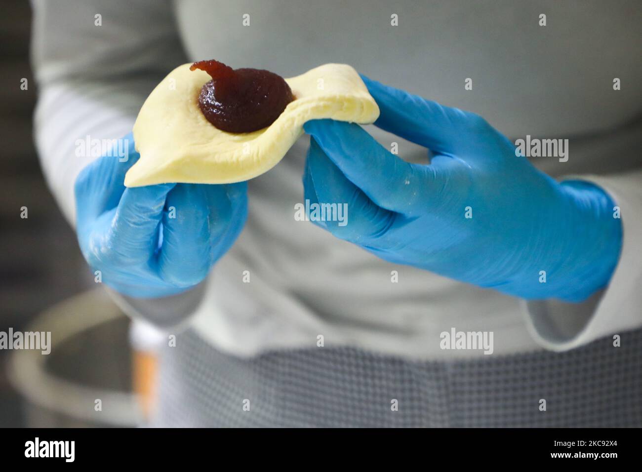 Bakery 'Dobra Paczkarnia' produces donuts for Fat Thursday. Krakow ...