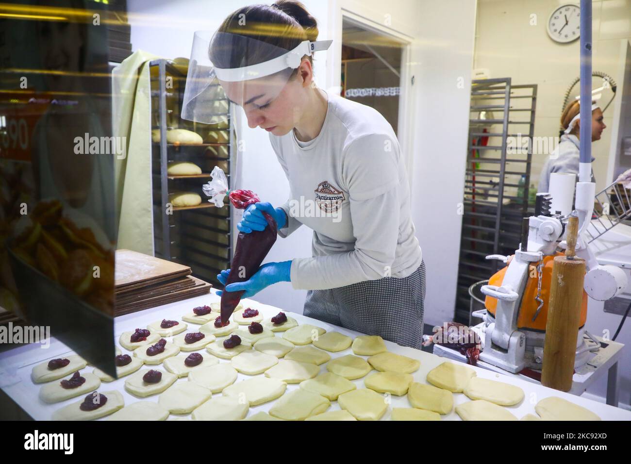 Bakery 'Dobra Paczkarnia' produces donuts for Fat Thursday. Krakow ...