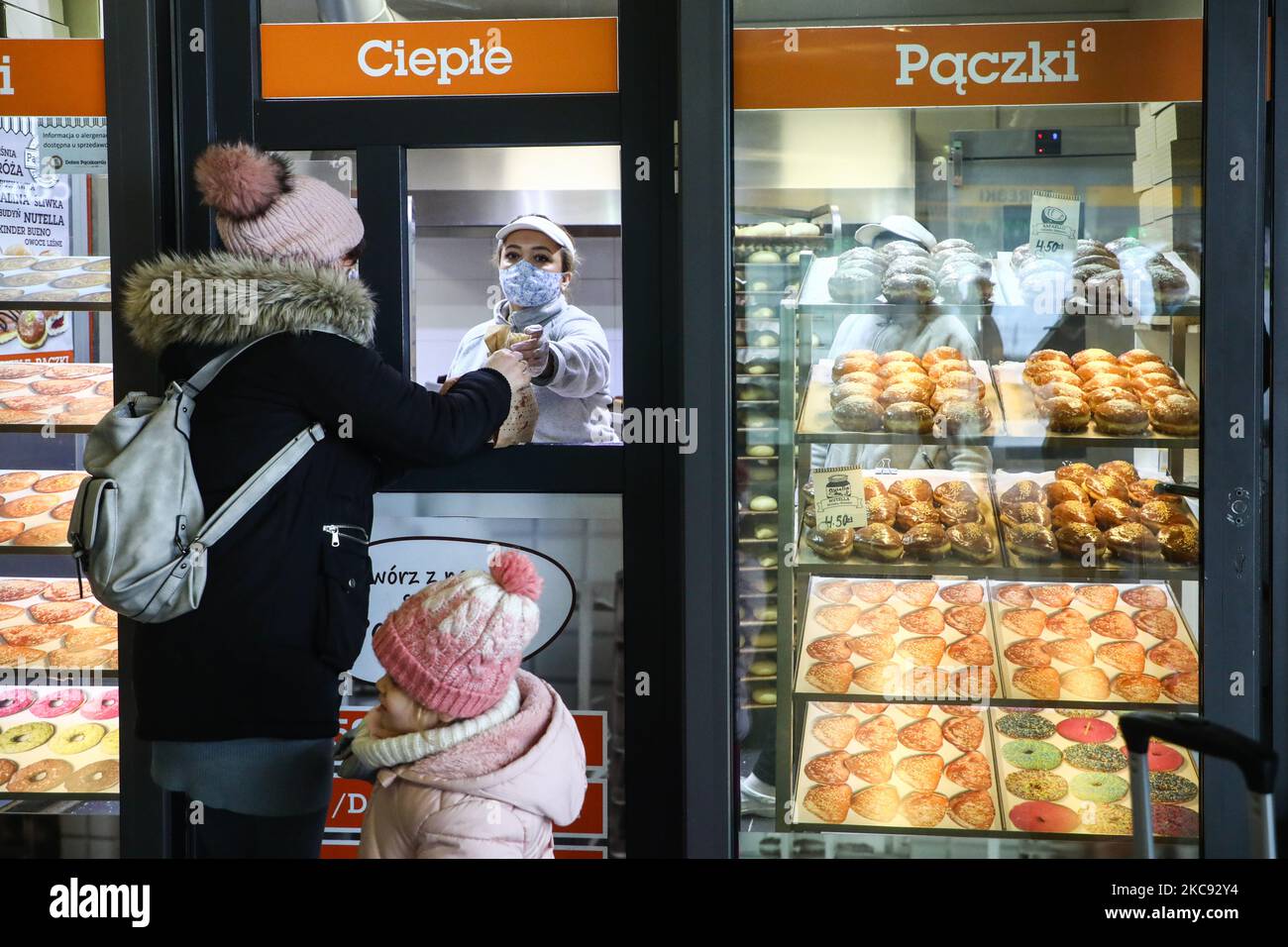 Bakery 'Dobra Paczkarnia' produces donuts for Fat Thursday during ...