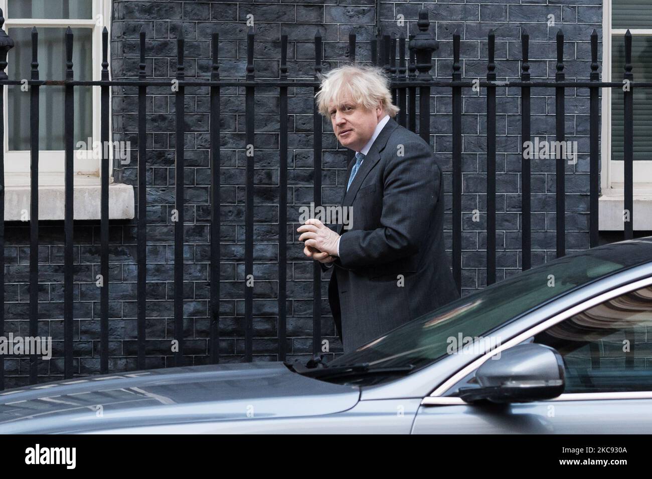 British Prime Minister Boris Johnson arrives in Downing Street after ...