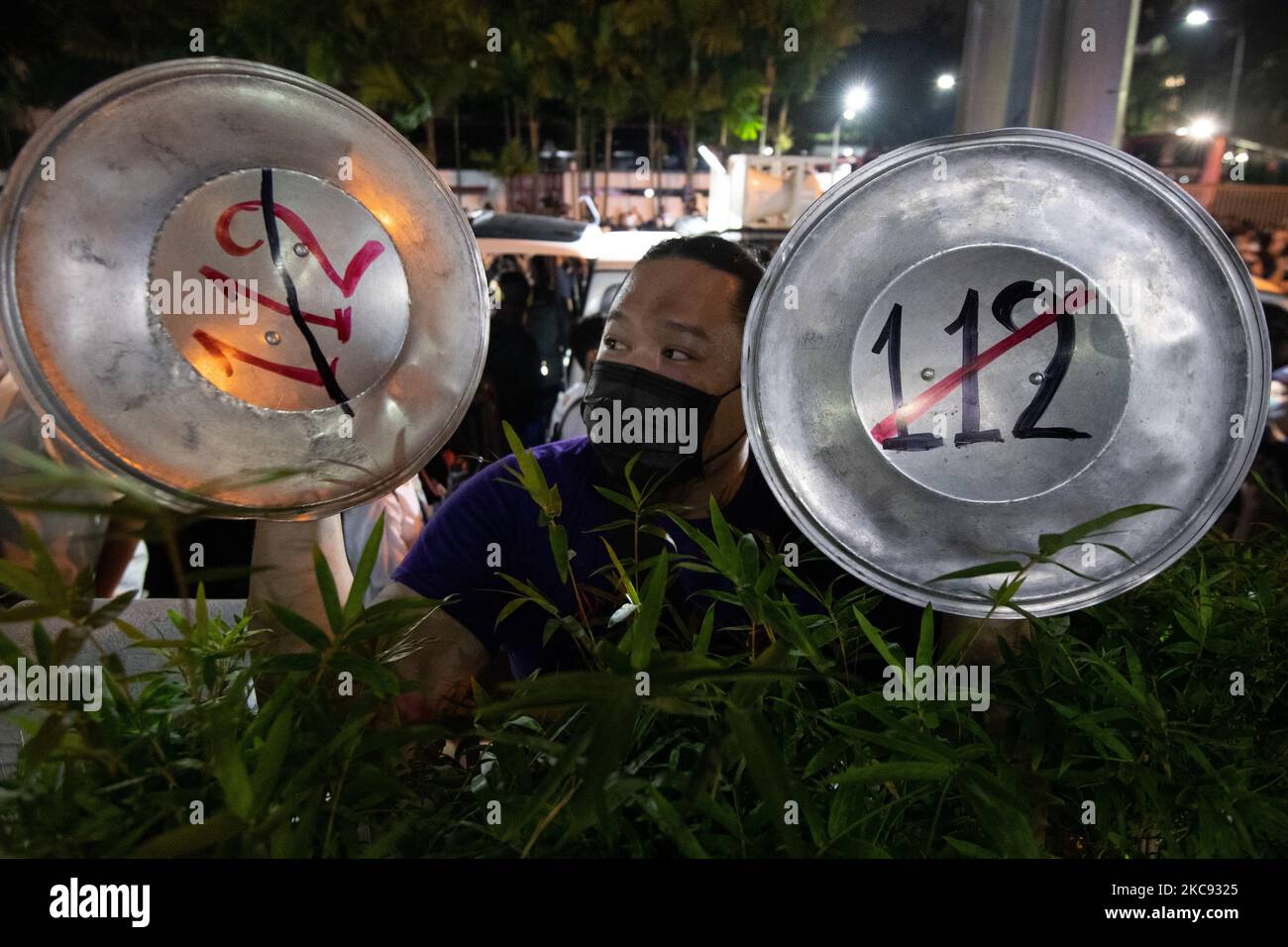 A pro-democracy protester bangs the pots for campaign abolish the ...