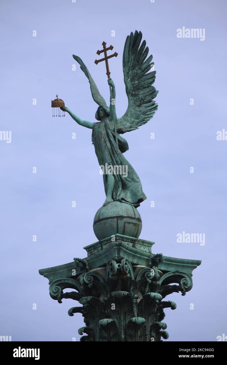 Statue on Budapest Heroes' Square. On the top of the column depicts ...
