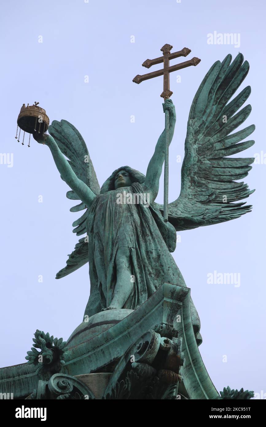 Statue on Budapest Heroes' Square. On the top of the column depicts ...