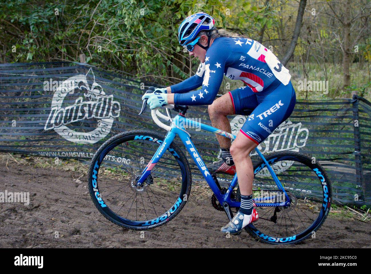 Katie Compton leads her competitors up a climb during the Derby City ...