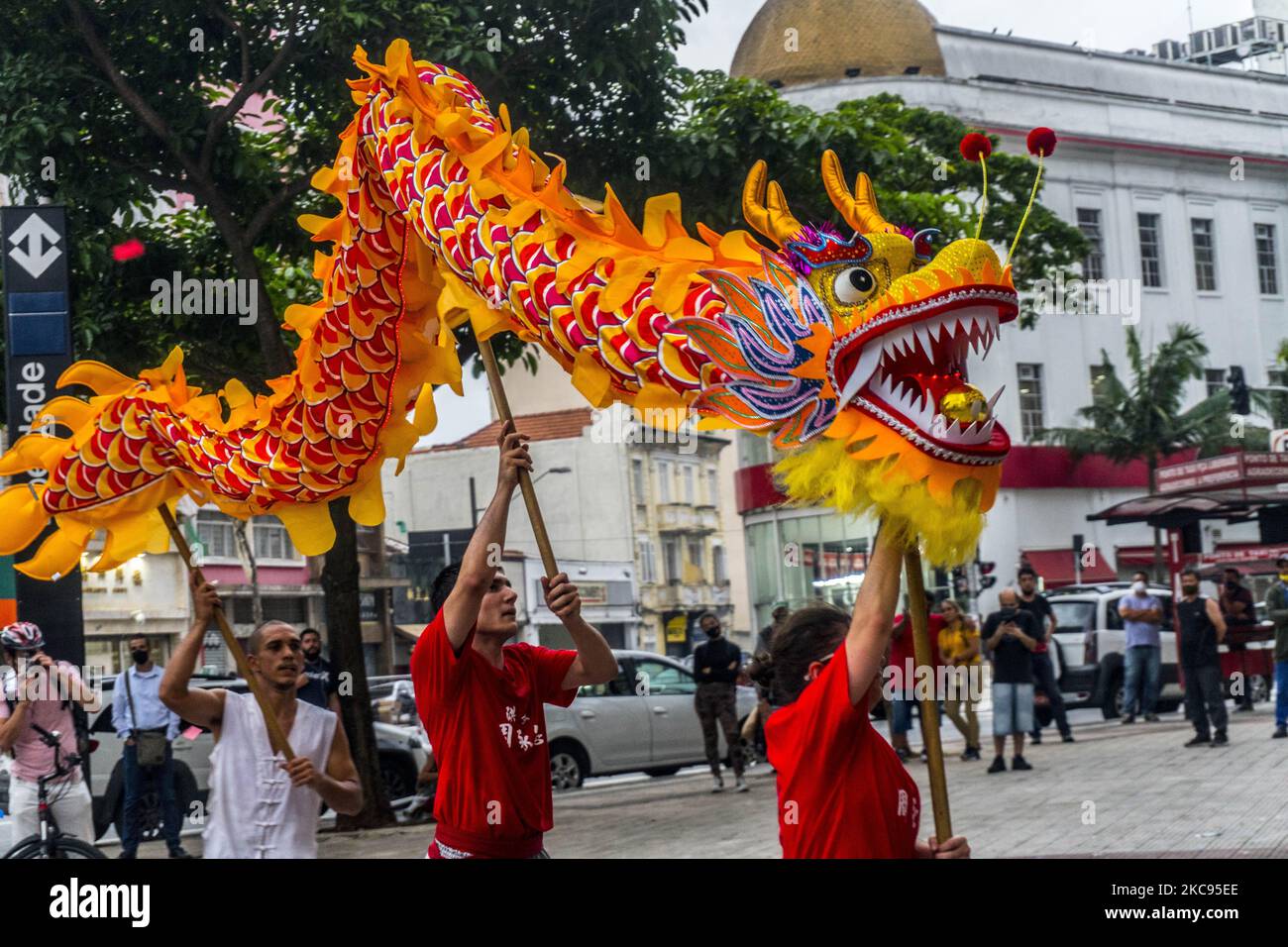 A fire dragon dance is performed during Chinese Lunar New Year ...