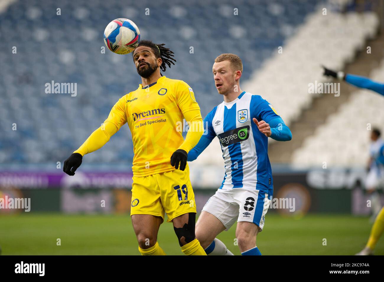 Garath McCleary of Wycombe Wanderers wins a header during the Sky Bet ...