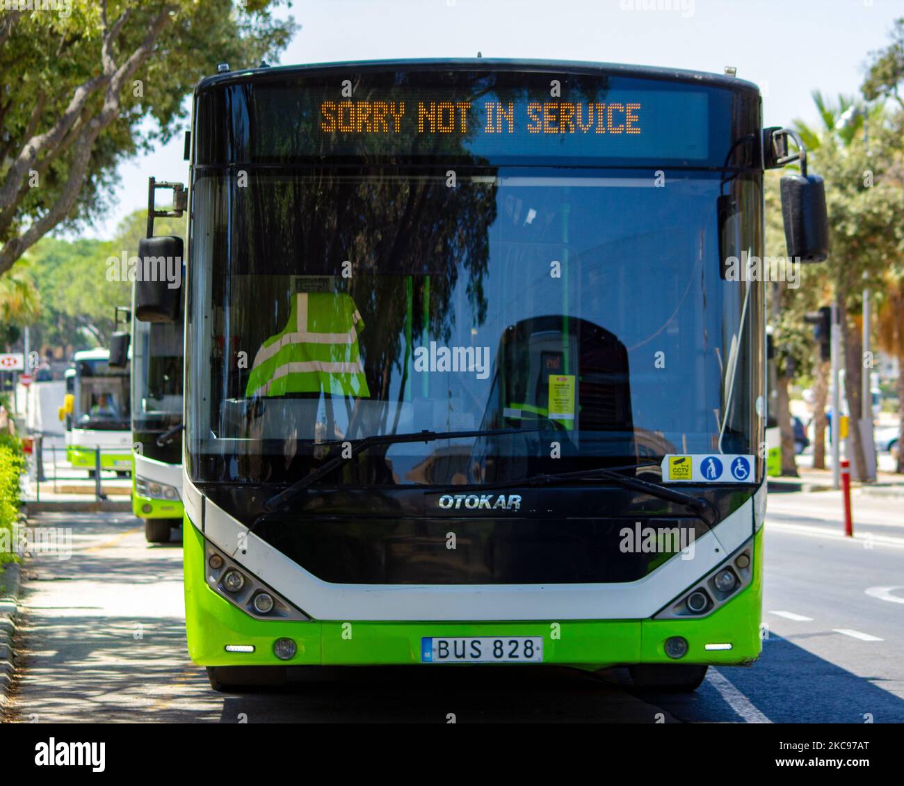 An out of service green public bus on a street in Floriana, Malta Stock ...