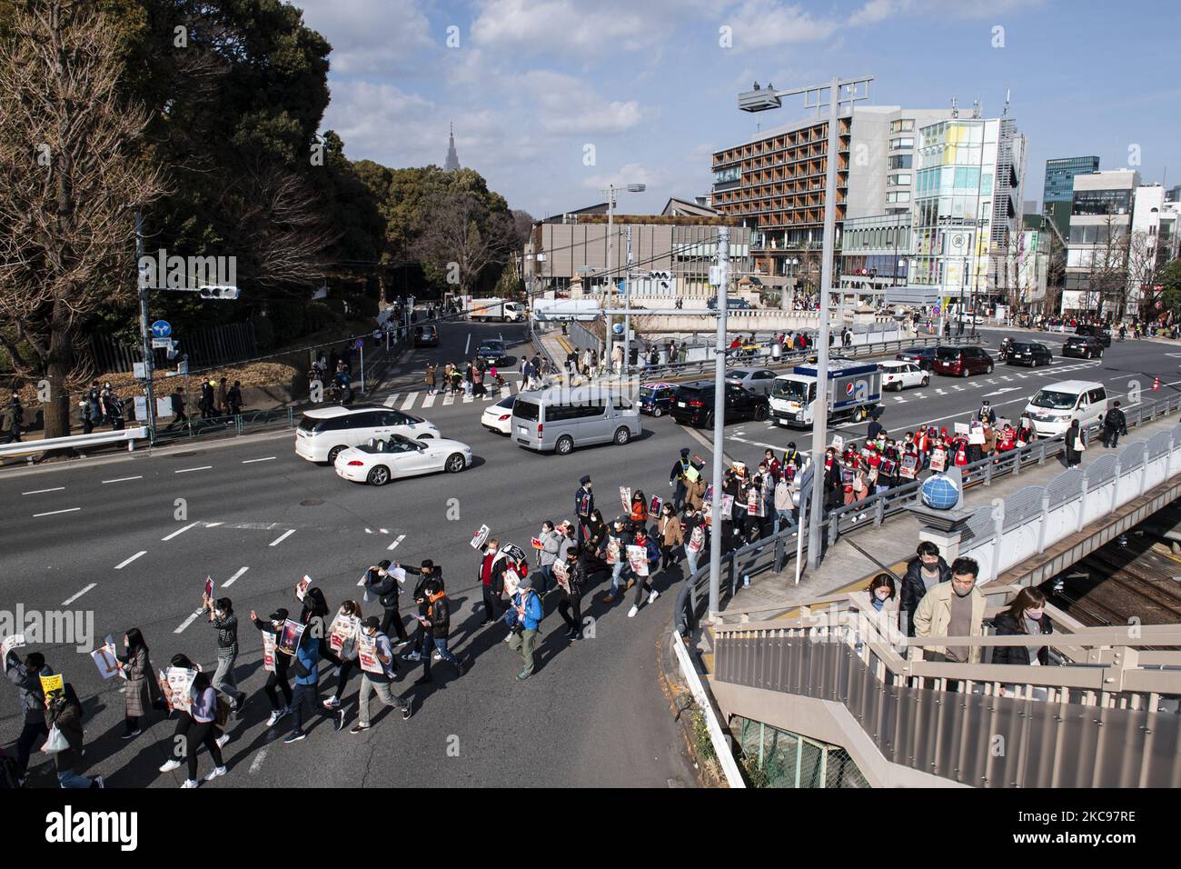 Participates holding placards and pictures march the streets on Sundayâ ...