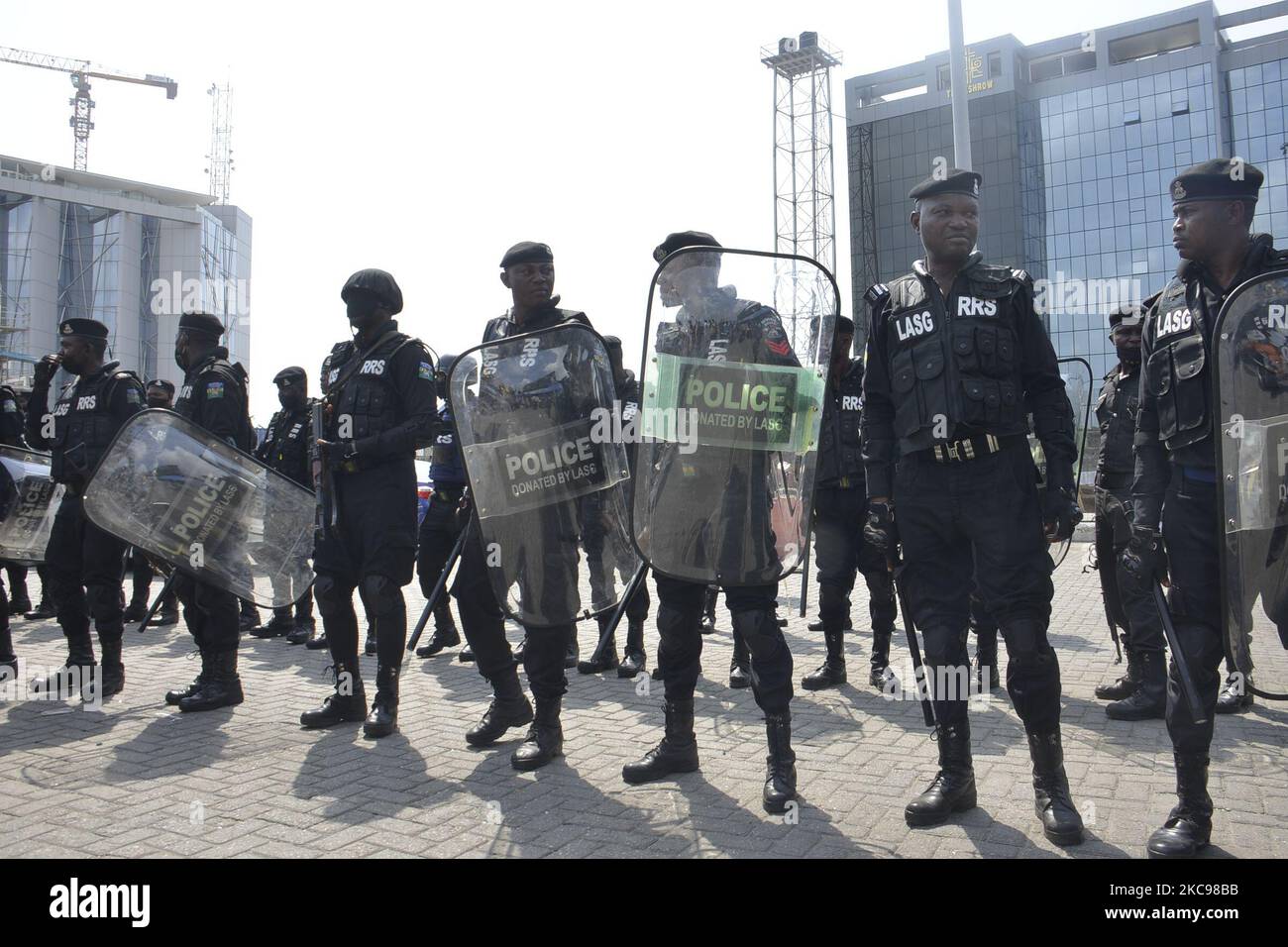 Men of the Rapid Response Squad stand on guard at the Lekki tollgate ...