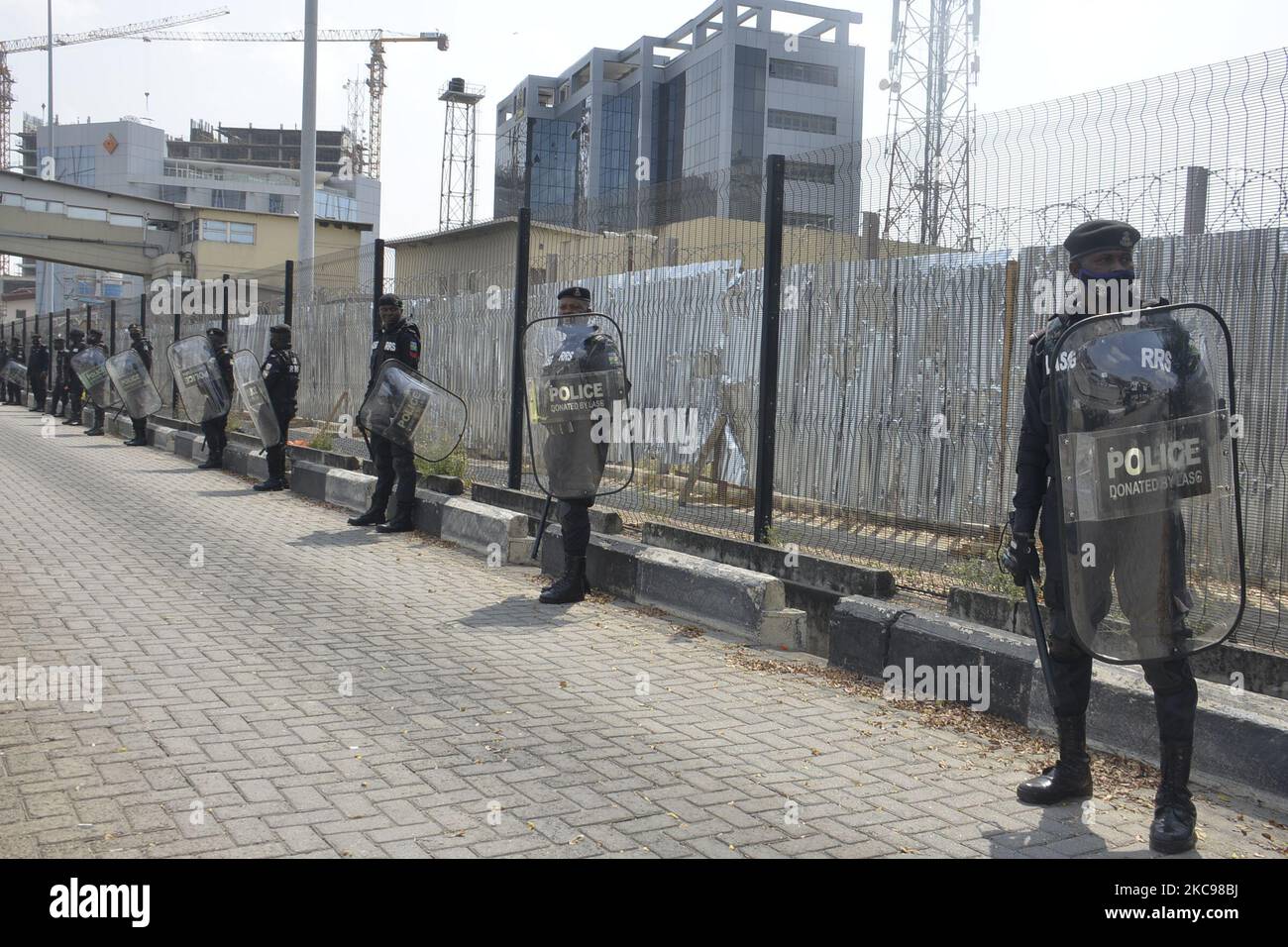 Men of the Rapid Response Squad stand on guard at the Lekki tollgate ...