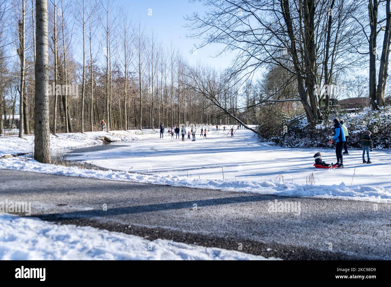 Ice skating on a frozen stream near the river 'de Vecht", Utrecht ...