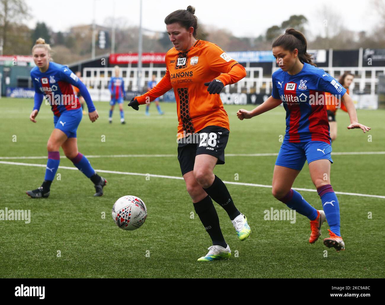 L-R Helen Ward of London Bees holds of Ffion Morgan of Crystal Palace ...