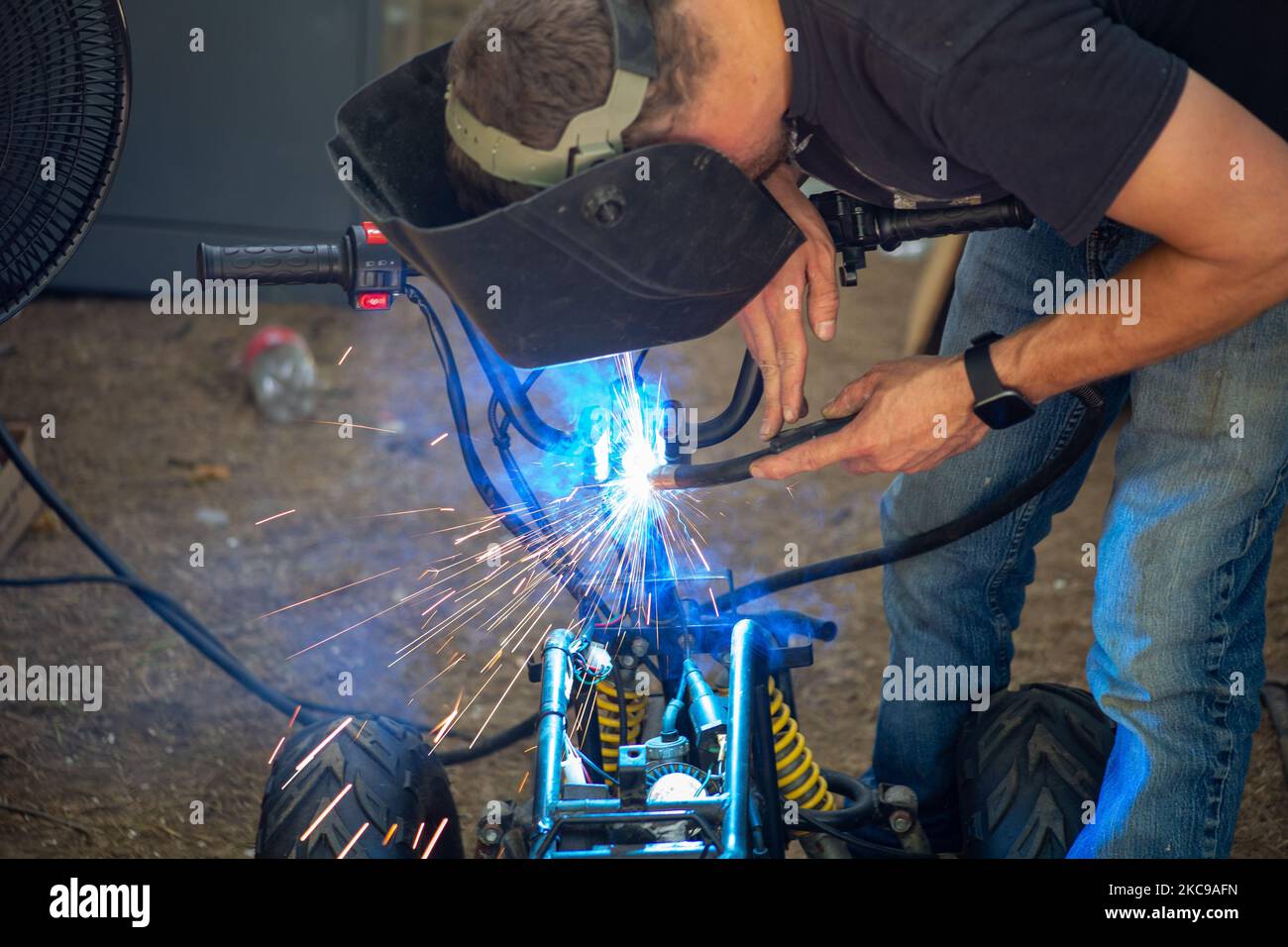 A closeup of male welding bike Stock Photo - Alamy