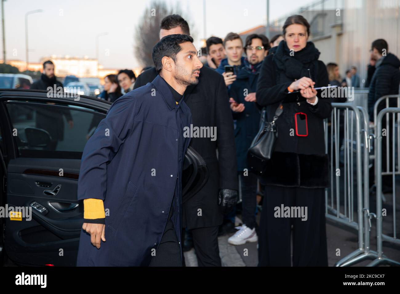 Riz Ahmed attends the Prada fashion show during Milan Men's Fashion ...