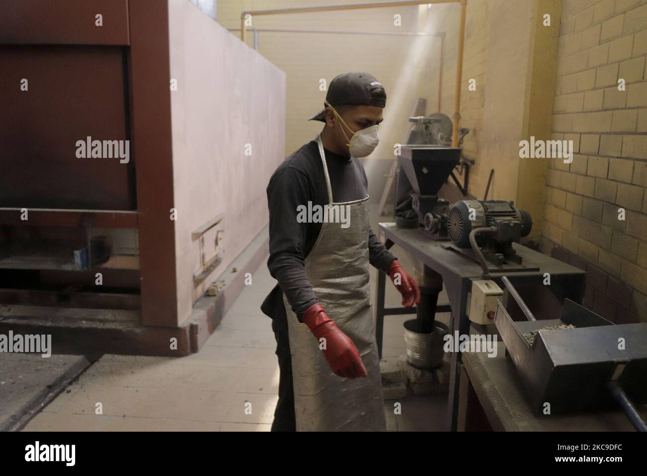 A worker at the Nezahualcóyotl Municipal Crematorium, located in the ...
