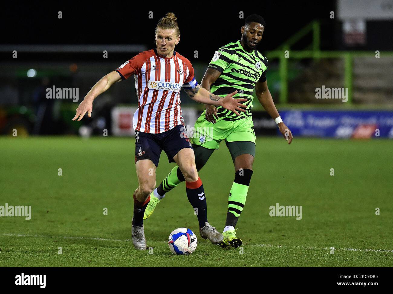 Oldham Athletic's Carl Piergianni tussles with Jamille Matt of Forest ...