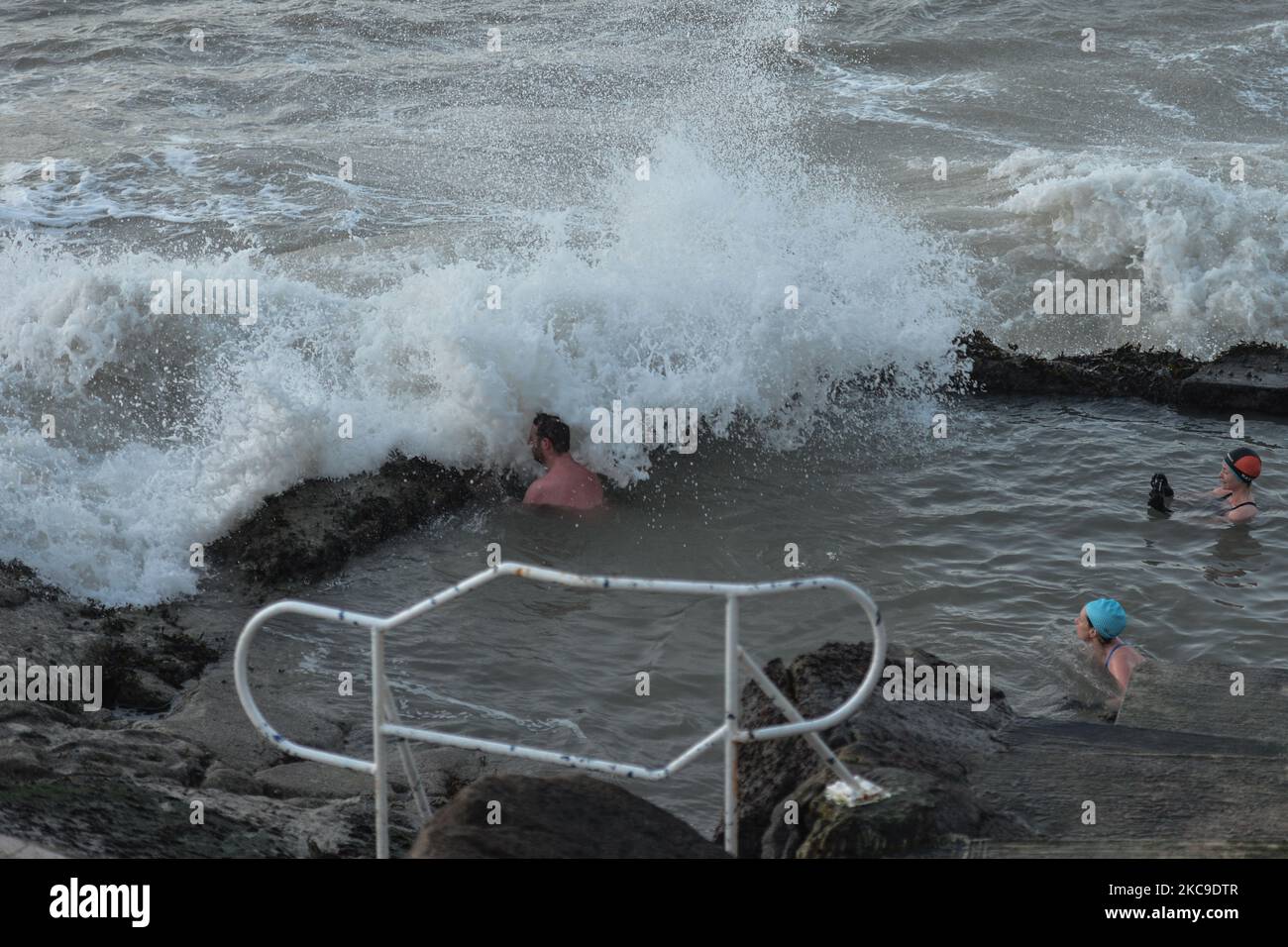 People take a morning swim at Vico's Bathing Site, Hawk Cliff in Dalkey ...