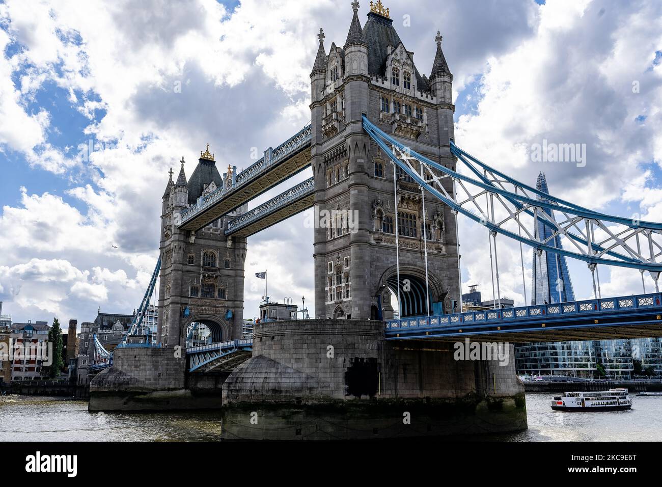 A low angle shot of Tower Bridge from the north shore in London ...