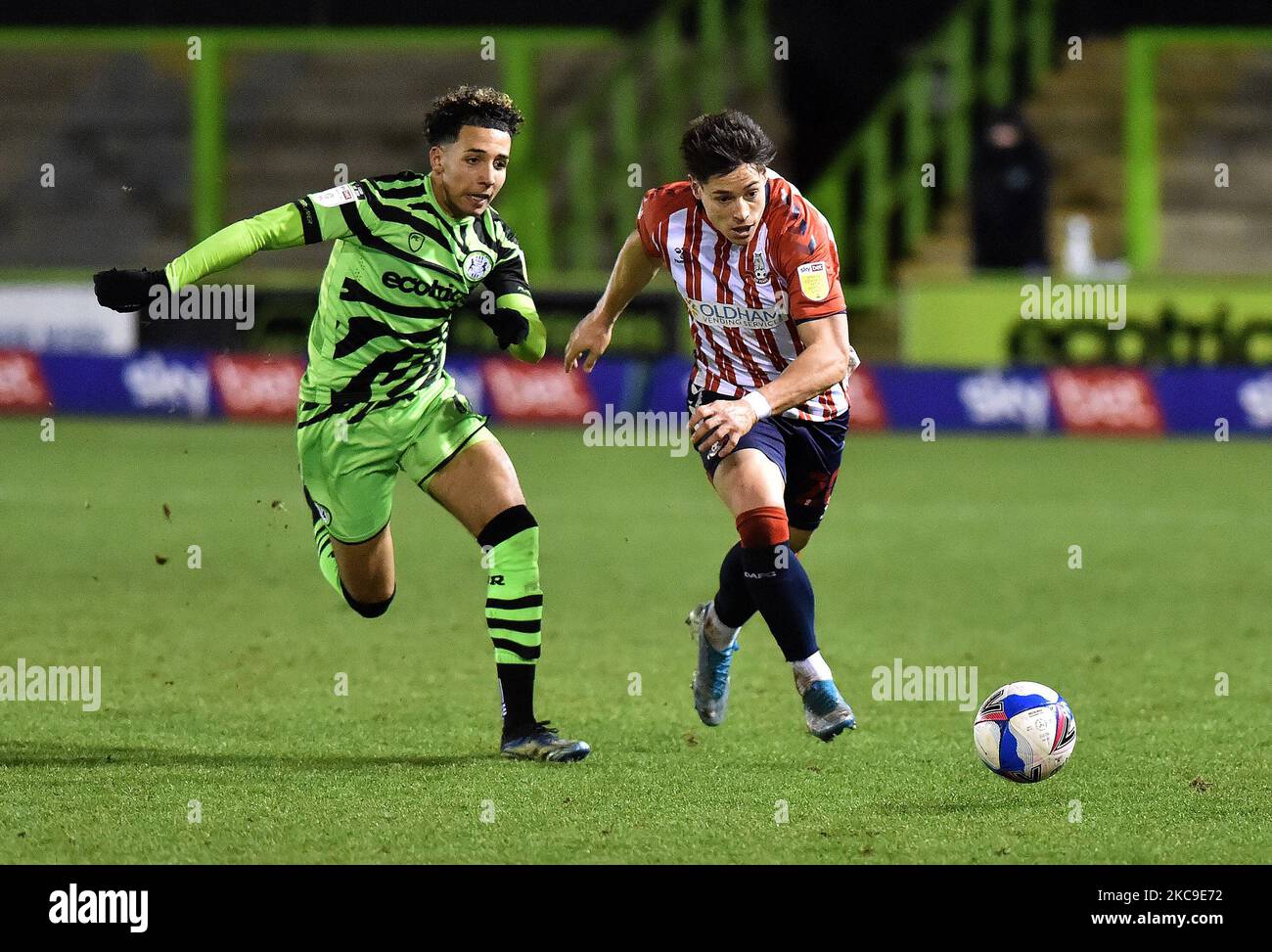 Oldham Athletic's Andrea Badan tussles with Odin Bailey of Forest Green ...