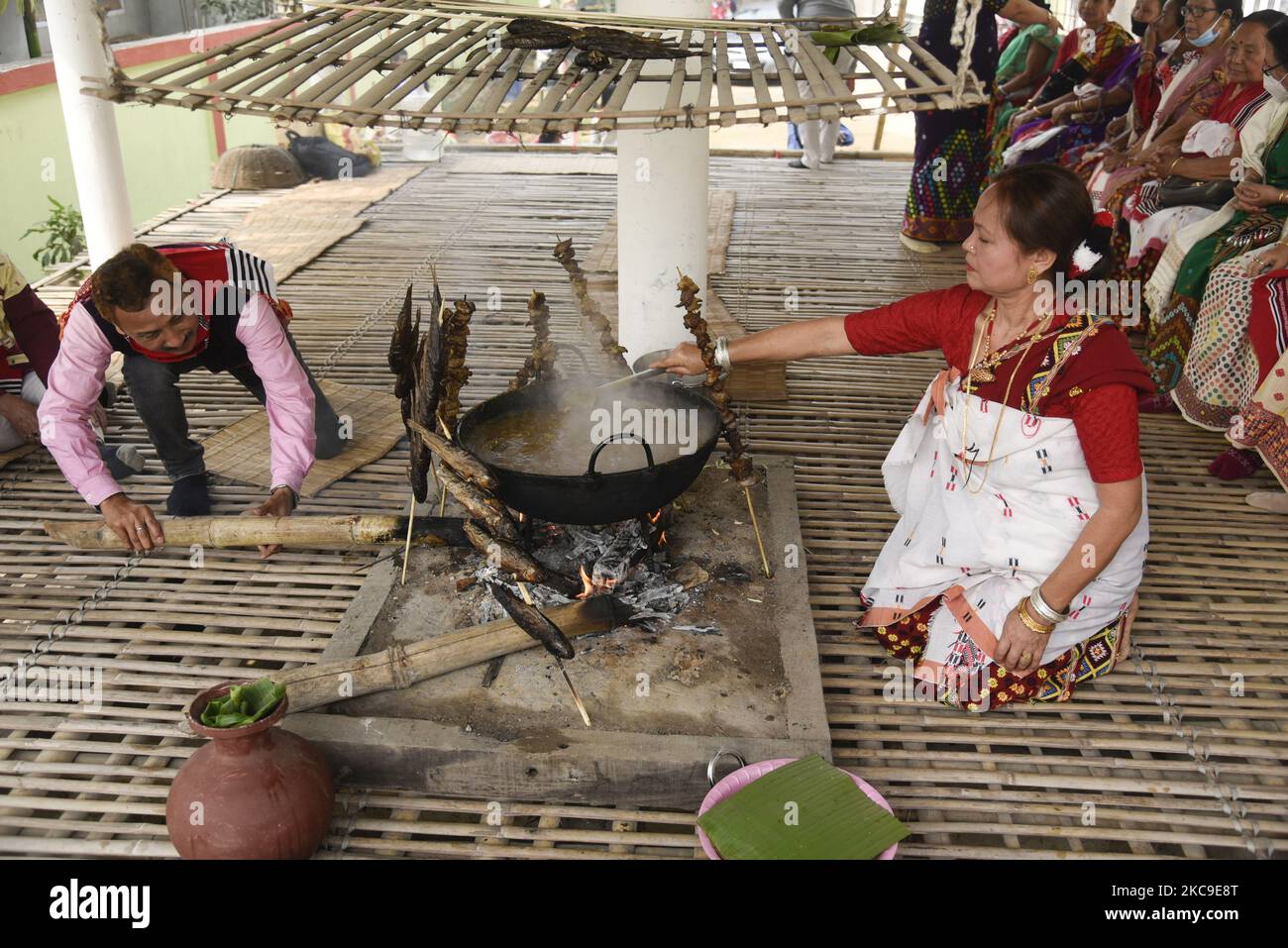Mising tribal people preparing traditional food during Ali-Aye-Ligang ...