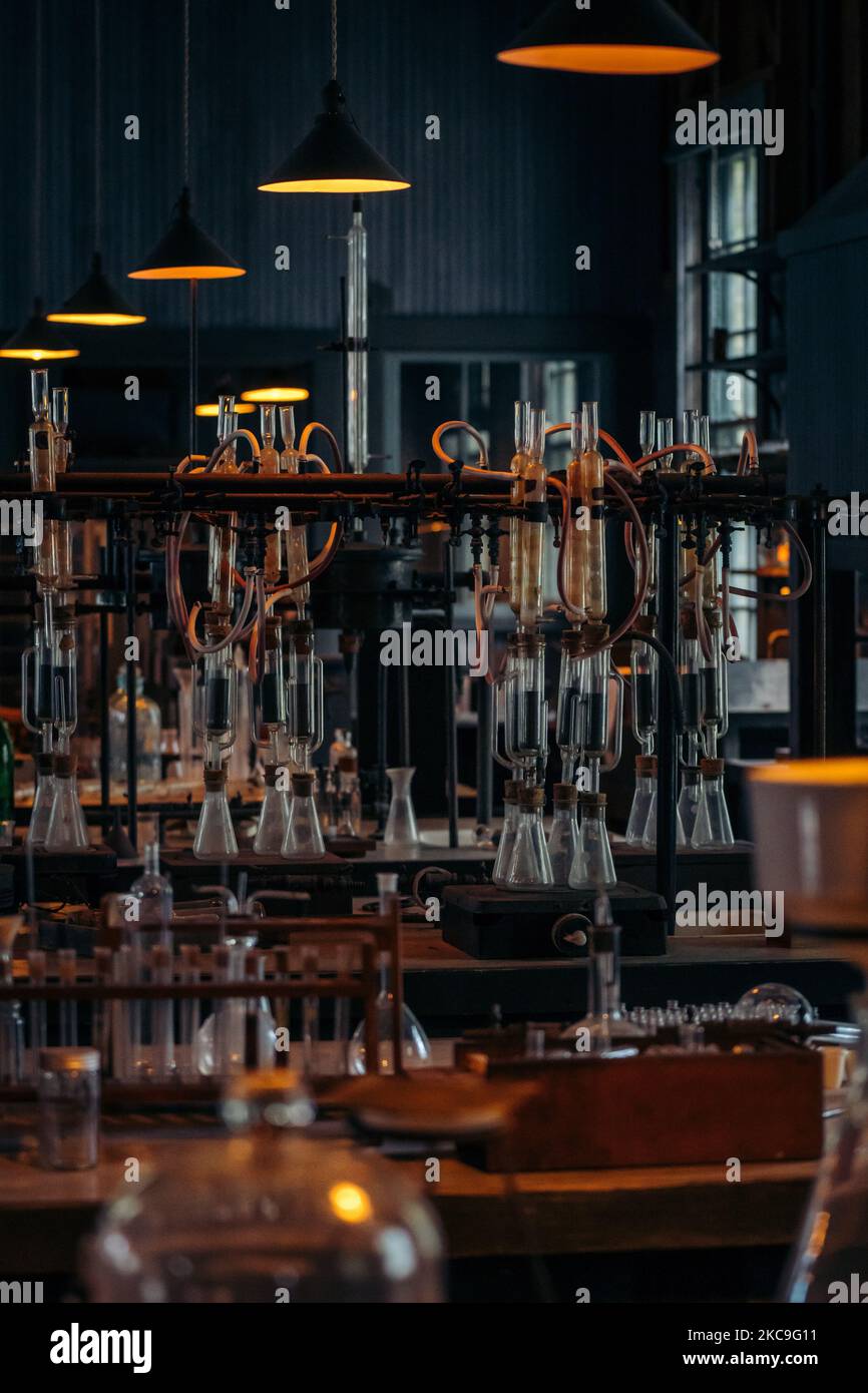 A dark walled old laboratory with many test tubes Stock Photo - Alamy