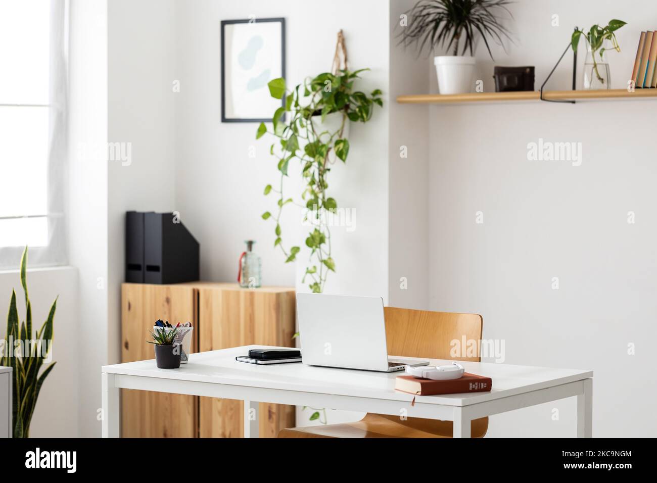 Bright business minimal workplace with laptop and office supplies Stock ...