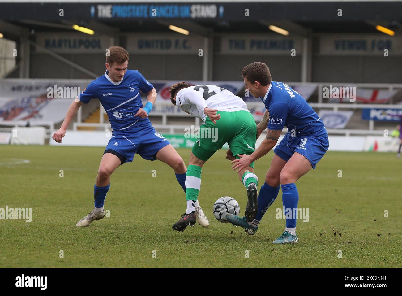 Hartlepool United's Mark Shelton (l) and David Ferguson battles with ...