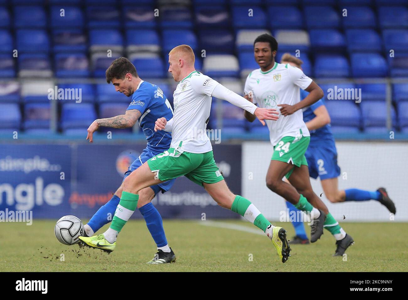 Gavan Holohan of Hartlepool United in action with Matt Worthington of ...