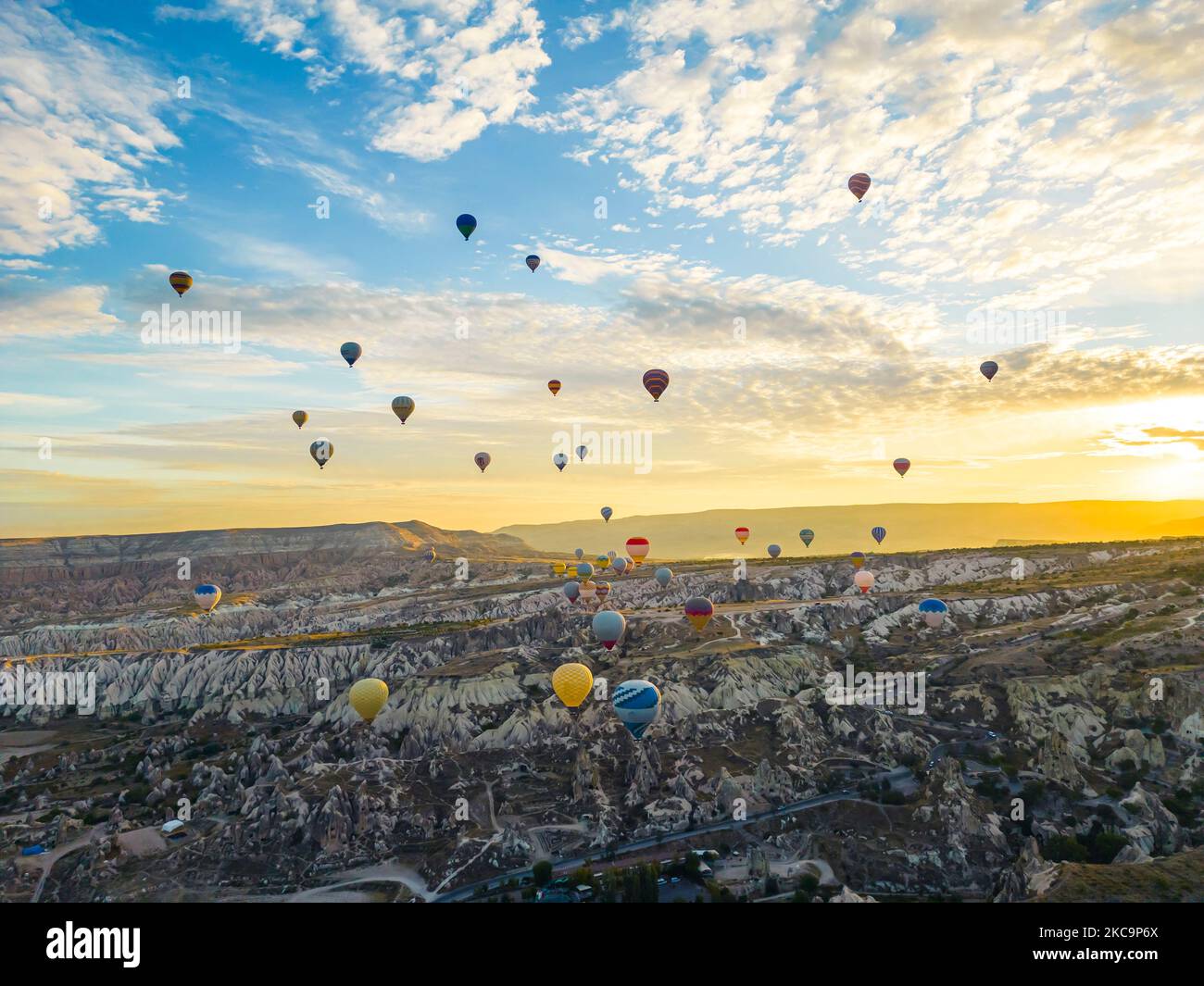 Spectacular drone view of hot air balloons ride over Turkey's iconic ...