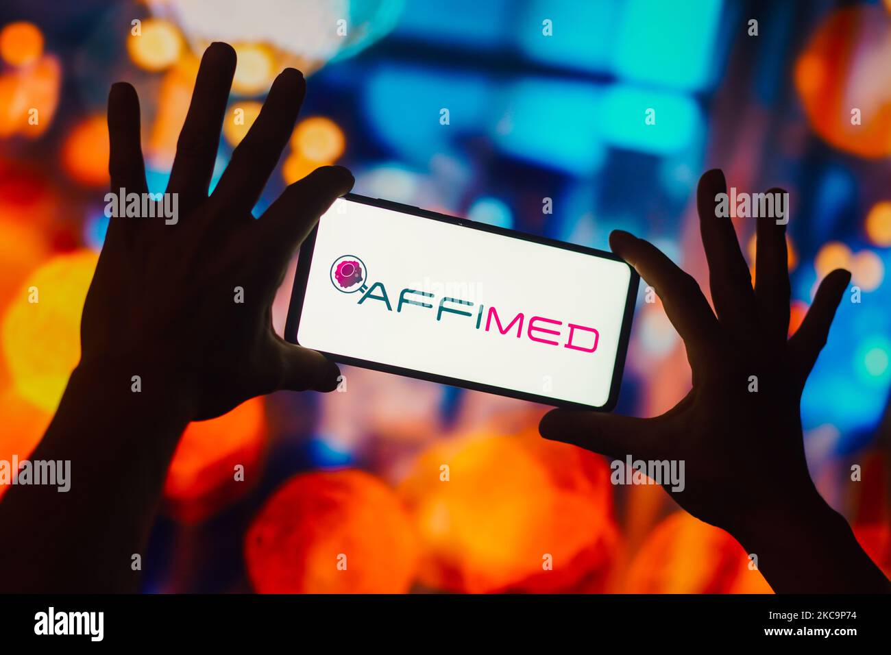 In this photo illustration, the Affimed logo is displayed on a ...